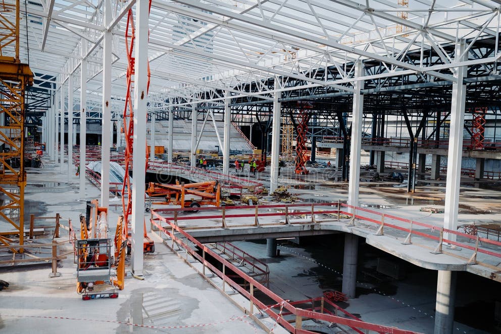 Builders Working on Structural Development at an Active Construction ...