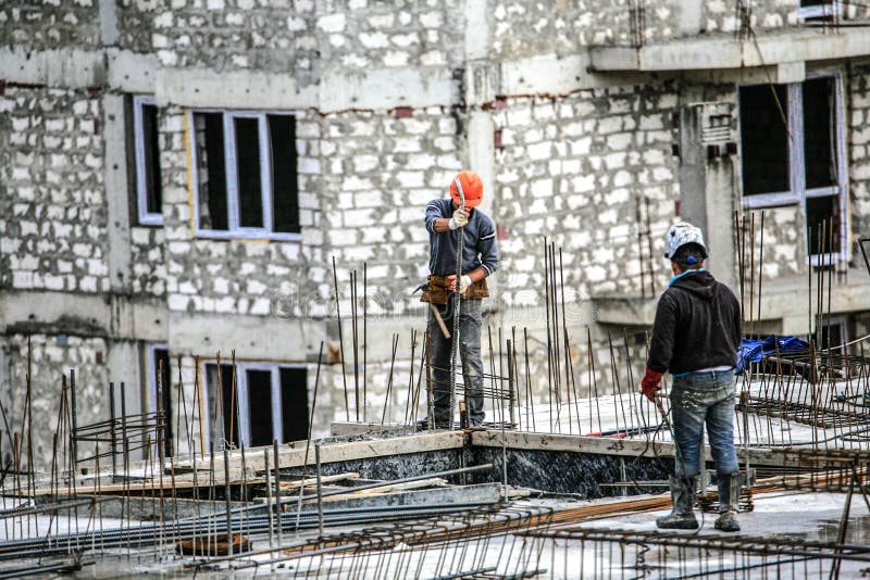 Builders Works on the Construction Site Editorial Stock Image - Image ...