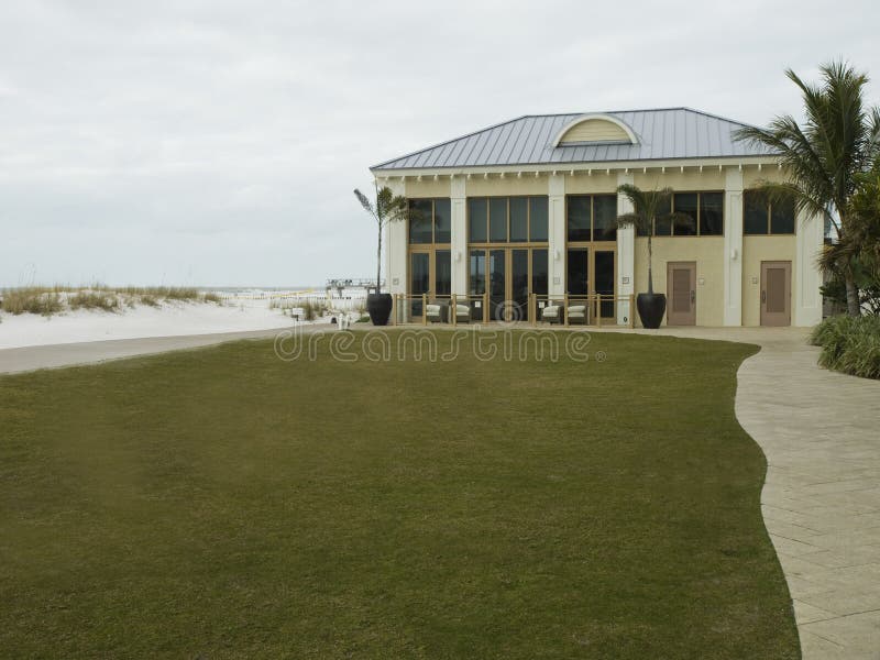 Building on the Beach with a Lawn and Walkway Stock Image - Image of ...