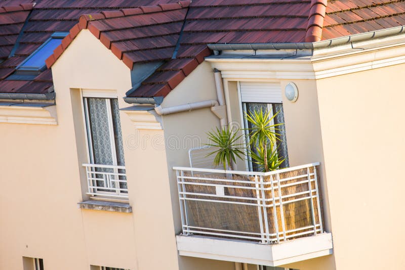 Building with Beautiful Flowers in a Small Balcony Stock Image - Image ...