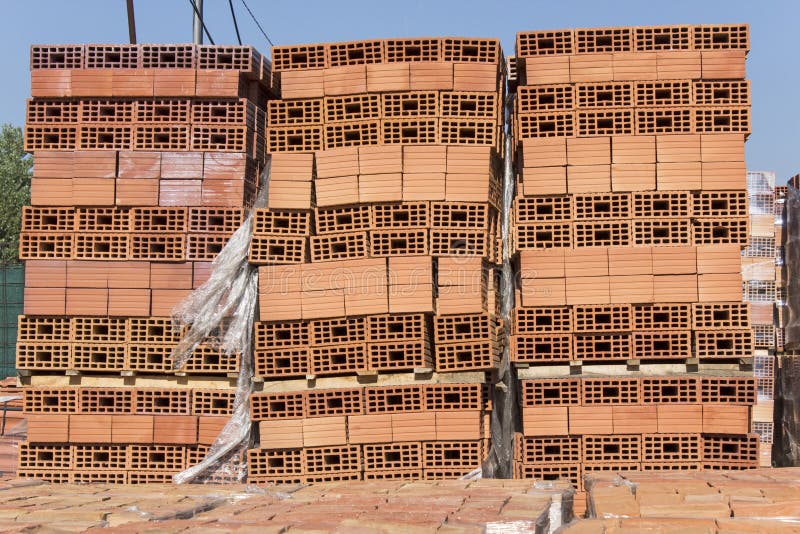 Building Blocks Stacked on Pallets Stock Image - Image of clay ...