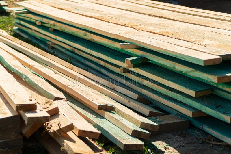 Building Boards Lying in a Pile at a Construction Site. Boards for Roof ...