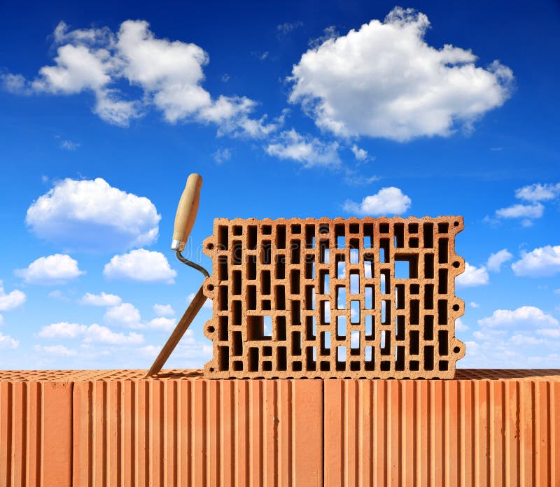 Building a brick wall. stock image. Image of home, house - 62374621