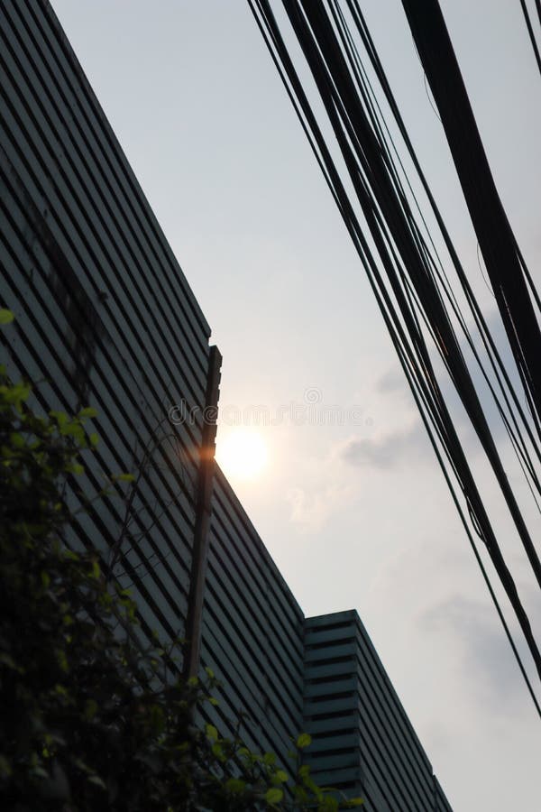 Building beside the Building, the Back Side is a View of the Sun. Stock ...