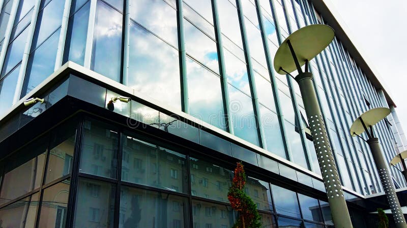 The Building of the Business Center in the Windows of Which the Cloudy ...