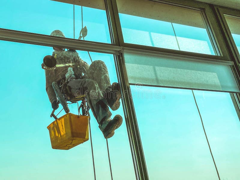 The Building Cleaner is Climbing for Clean Stock Image - Image of ...