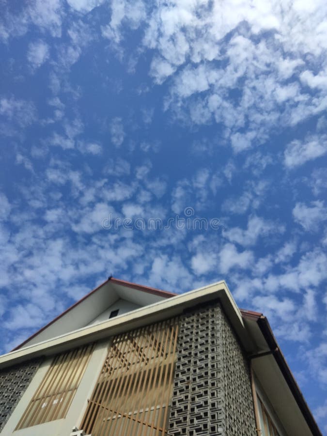 Building in the clouds stock image. Image of clouds - 261805093