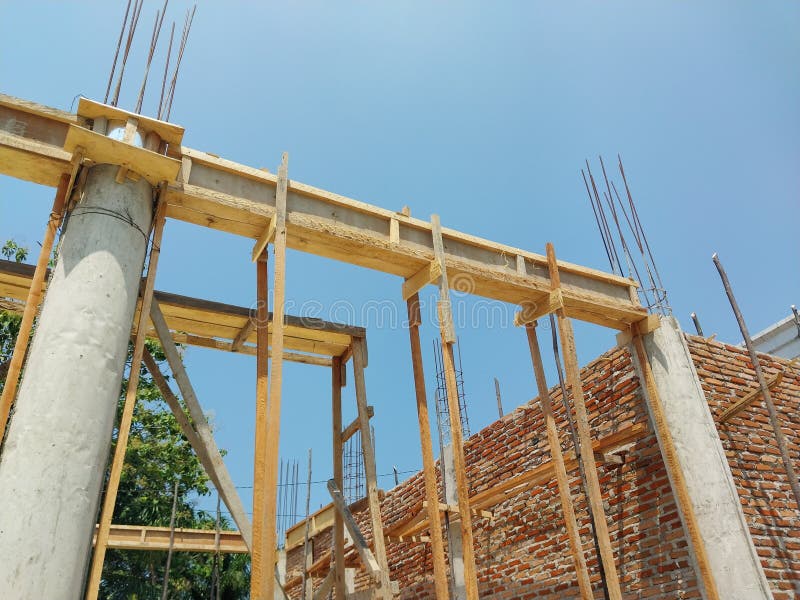 Building Under Construction. a Building Column Whose Formwork Has Just ...