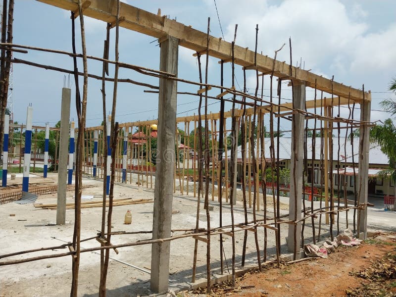 Building Under Construction. a Building Column Whose Formwork Has Just ...