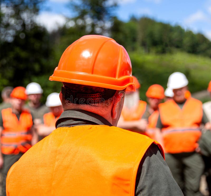 Building Concept. Architector, Engineers on Constructing Site. Helmet ...
