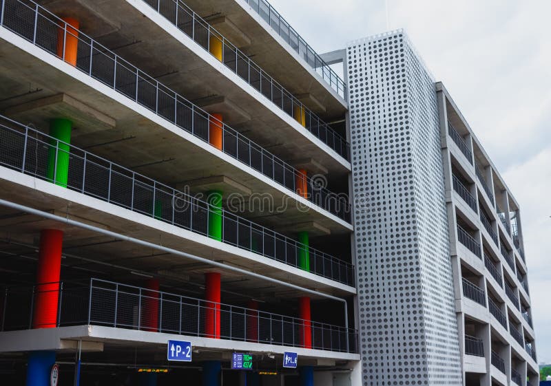 Building with Concrete Floors and Colored Support Columns Stock Image ...