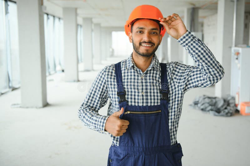 Building, Construction and People Concept. Builder at Construction ...