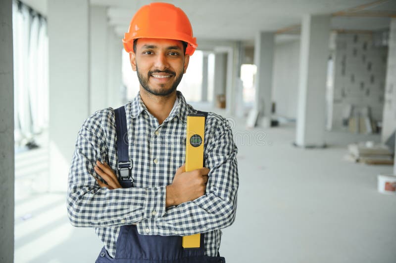 Building, Construction and People Concept. Builder at Construction ...