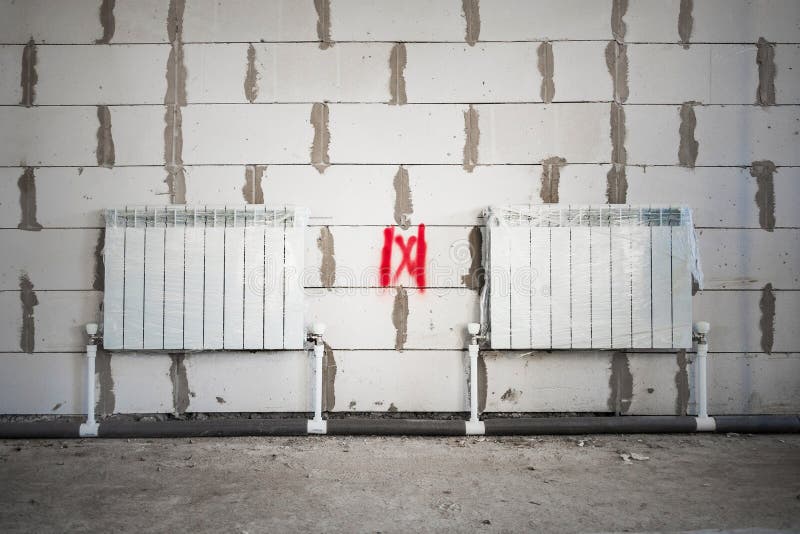 Building Construction Progress: Heating Radiators Installed in Rough ...