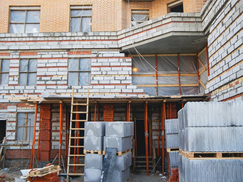 Building Construction in Progress, Showing Brickwork, Windows, and ...