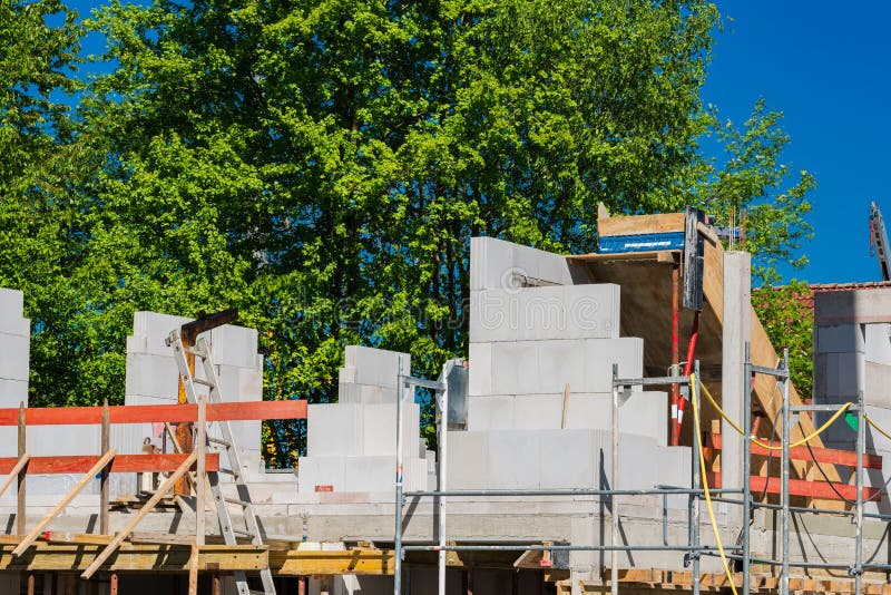 Building Construction in Progress Under Clear Blue Sky Stock Image ...