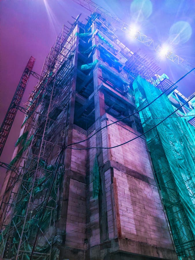 Building Construction Seen from Below at Night. Building Stock Image ...