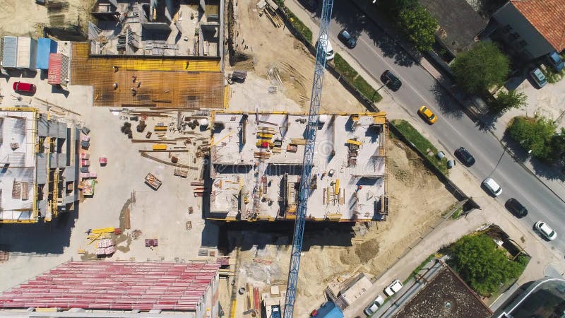 Building, Construction and Architect with a Team Working on Site while ...