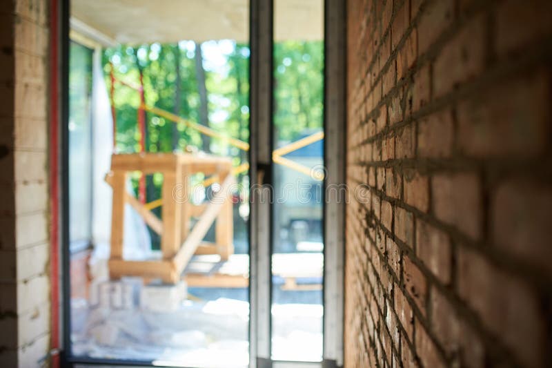 Building, Construction Site in Progress To New House, Brick Wall in the ...