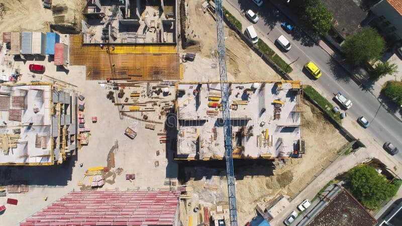 Building, Construction and Architect with a Team Working on Site while ...