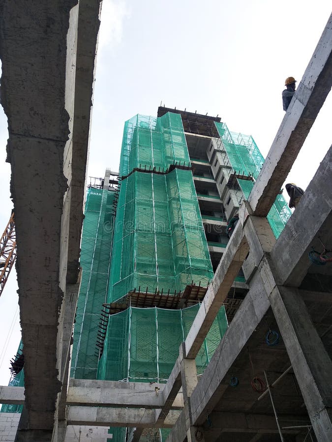 Building Construction Work is Underway at a Construction Site ...