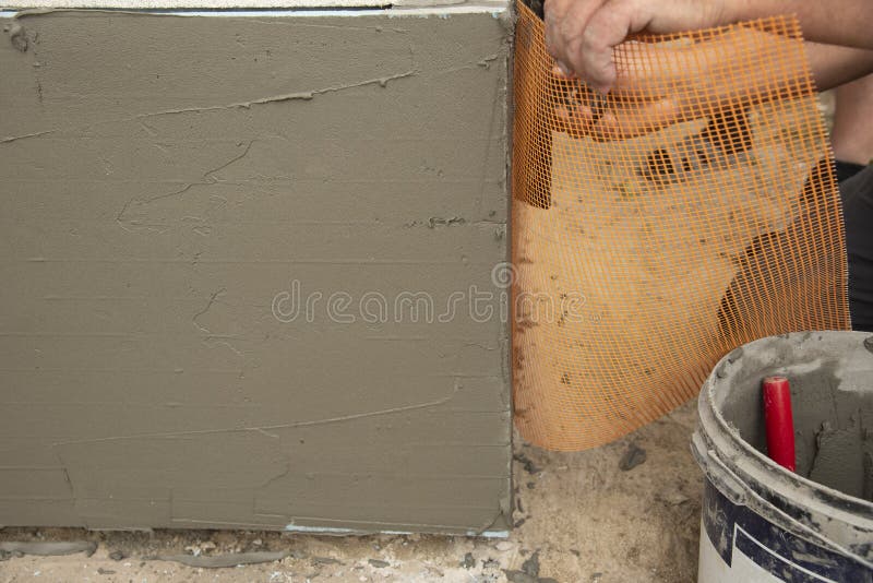 A Building Contractor is Installing a Reinforcing Mesh Stock Image ...