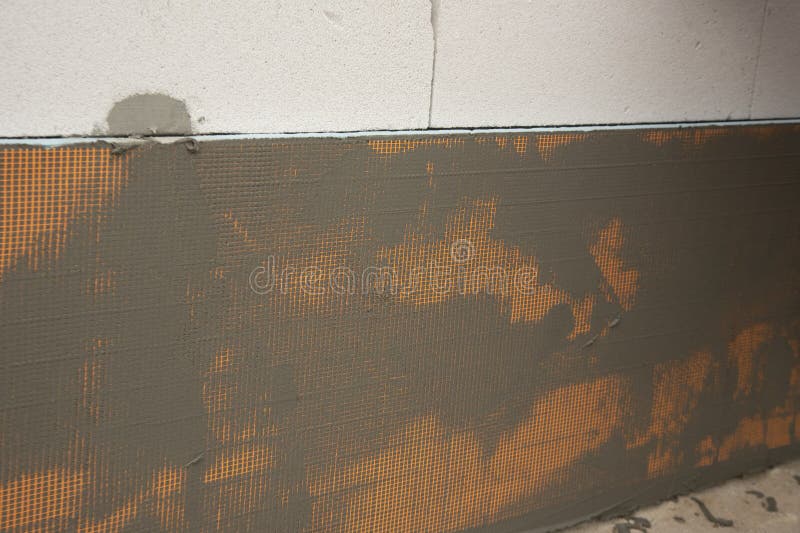 A Building Contractor is Installing a Reinforcing Mesh Stock Photo ...