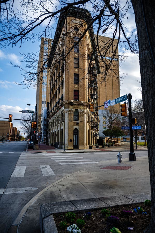A Building on the Corner of 9th and Houston St, Captured with Bare Tree ...