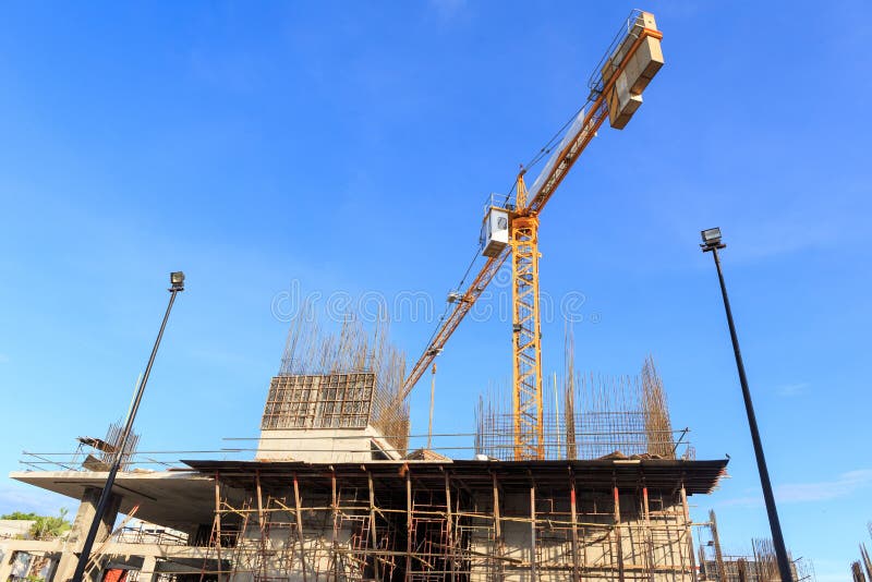 Building Crane and Construction Site Under Blue Sky Stock Image - Image ...