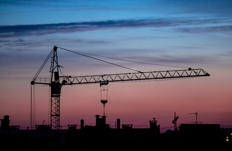 Building crane sunset stock photo. Image of engineering - 107036236