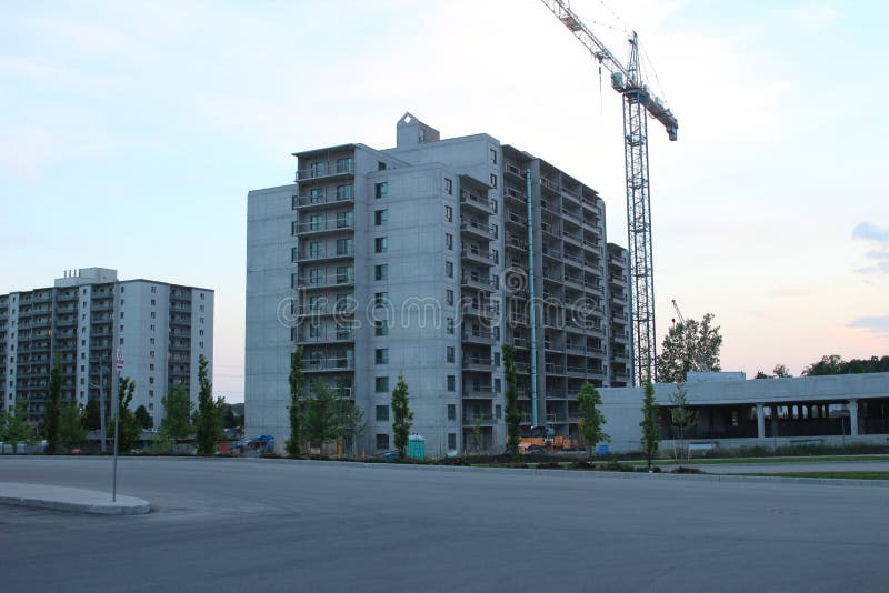 Building Crane and Building Under Construction. Construction Site ...