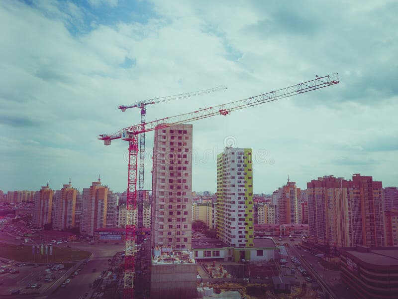 Building Crane and Building Under Construction. Construction Site ...