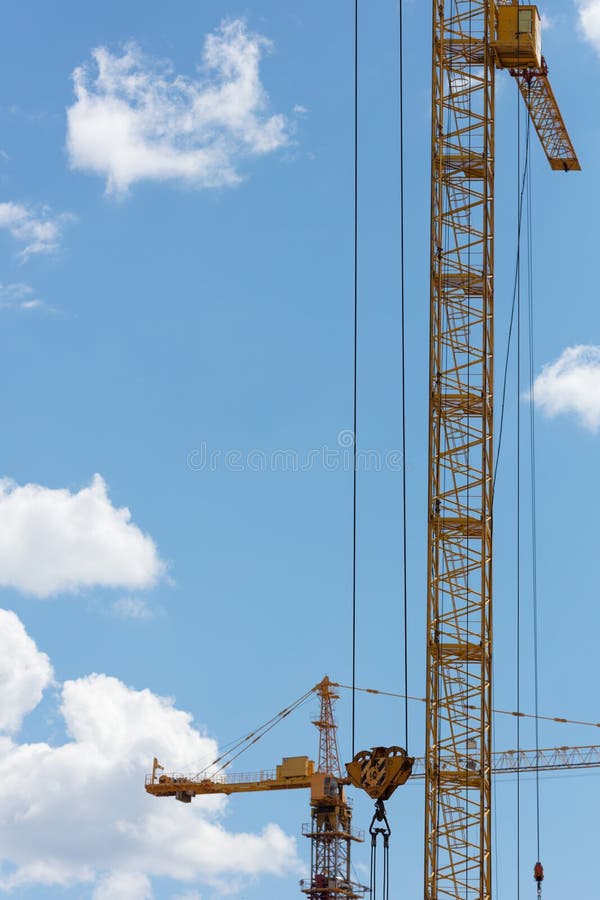 Building with Cranes stock photo. Image of blue, construction - 94871448