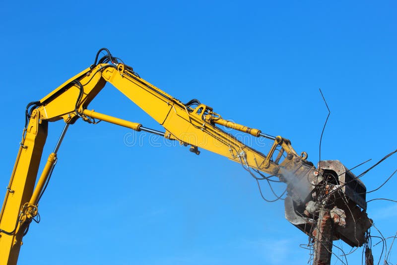 Large Demolition Crane Claw Dismantling a Building Stock Photo - Image ...