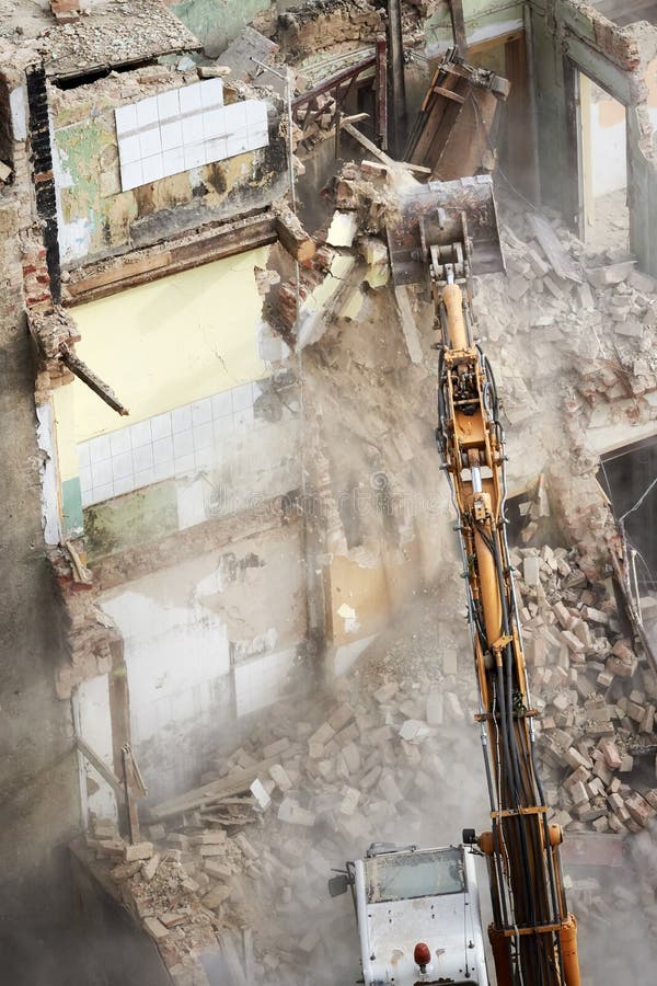Building Demolition with an Excavator in Dust Cloud. Stock Image ...