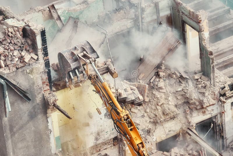 Building Demolition with an Excavator in Dust Cloud. Stock Image ...