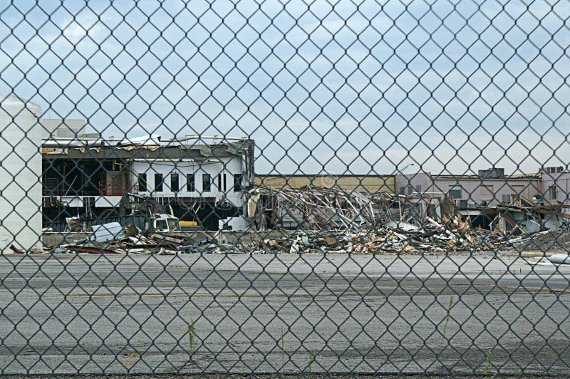 Building Destruction Behind Fence Stock Photo - Image of damage ...