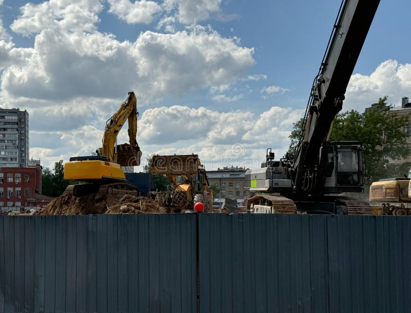 Building Destruction, Demolition of a Building by an Yellow Excavators ...