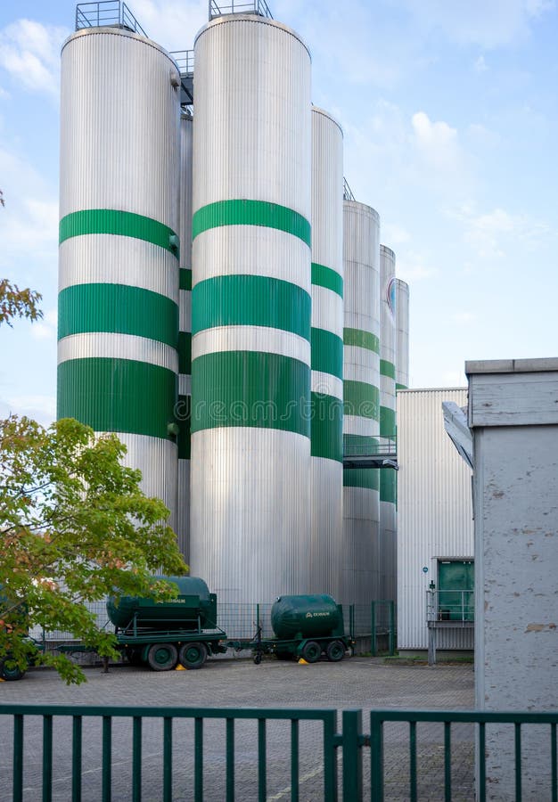 The Building of the Eichbaum Brewery with Silos and Flags Editorial ...
