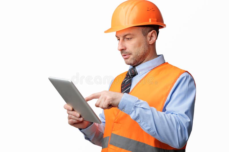 Building Engineer Using Digital Tablet Computer, Studio Shot Stock ...