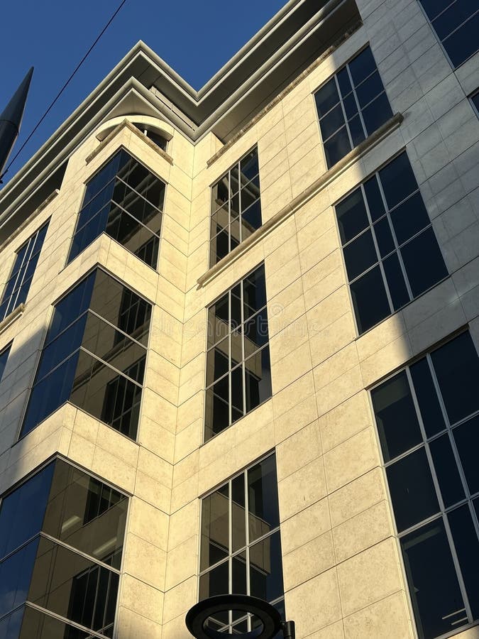 Building Exterior with Windows at Sunset Featuring Architectural ...