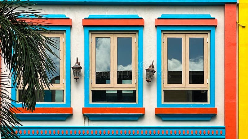Building Facade with Coloured Windows Stock Image - Image of orange ...