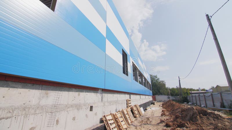 Building Facade Covered with Panels at Construction Sit Stock Footage ...