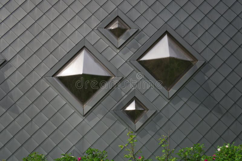Building Facade with Diamond-shaped Windows. Stock Photo - Image of ...