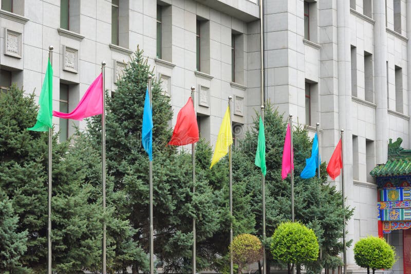 Building facade and flags stock image. Image of background - 128323931