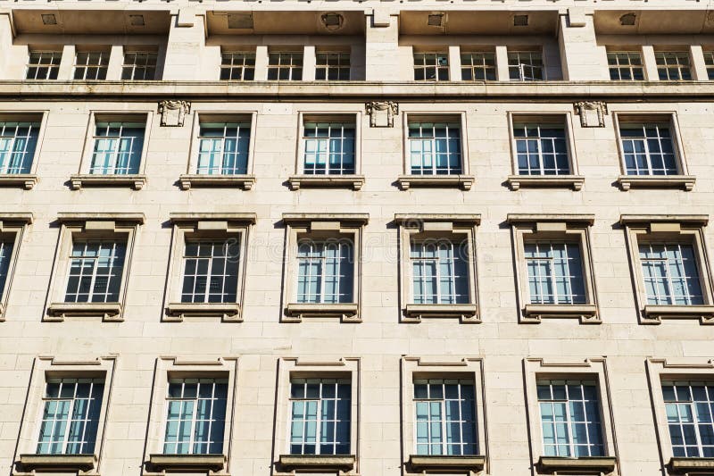 Building Facade with Grid of Windows Stock Image - Image of formal ...