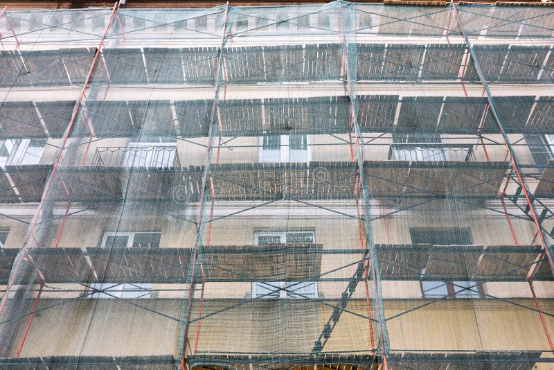 Building Facade Renovation with Green Protective Net Stock Image ...