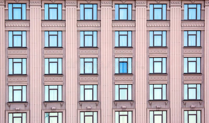 Building Facade with Windows. Residential Building Industry in the City ...