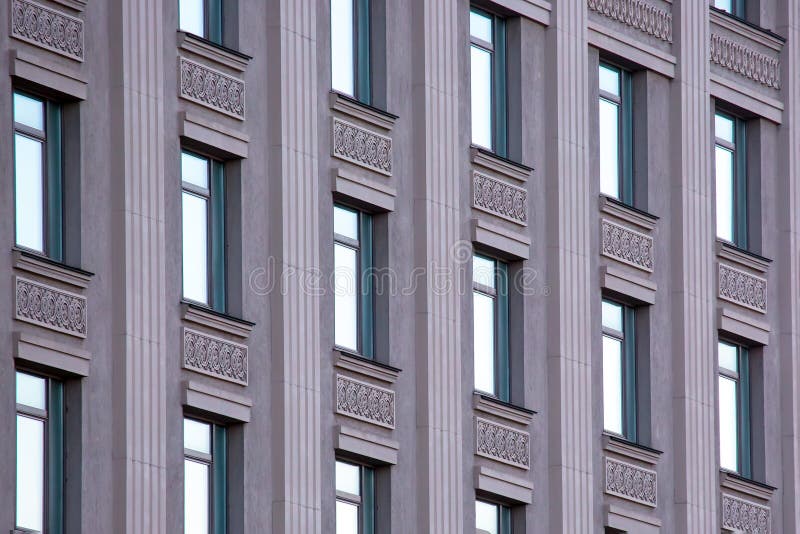 Building Facade with Windows. Residential Building Industry in the City ...