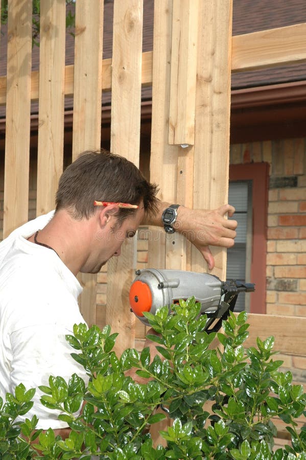Building a Fence stock photo. Image of hose, outside, construction - 708564